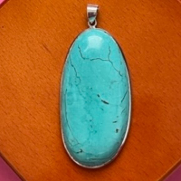 Jewelry | Large Oval Turquoise Stone Set In A Simple Silver Frame And ...